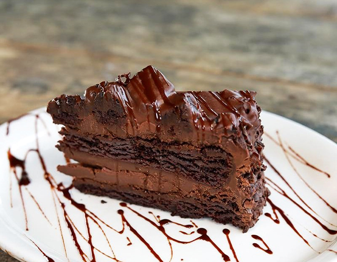 A chocolate cake so decadent it should require a permit. Those layers aren't just dessert&mdash;they're therapy in fork-ready form.