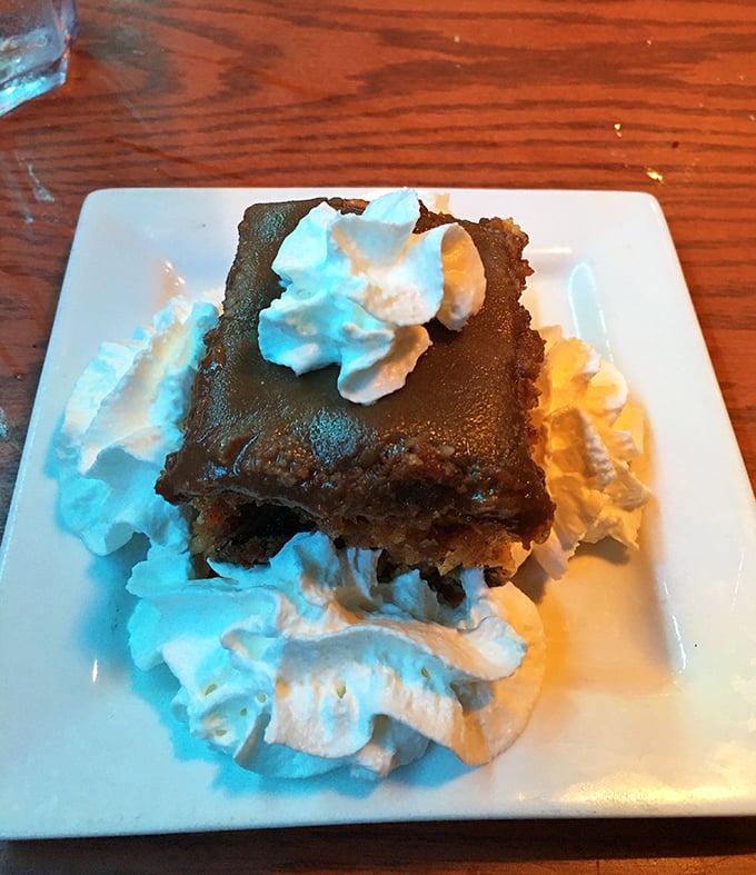 This chocolate dessert surrounded by whipped cream isn't just ending your meal&mdash;it's starting a whole new relationship with your sweet tooth.