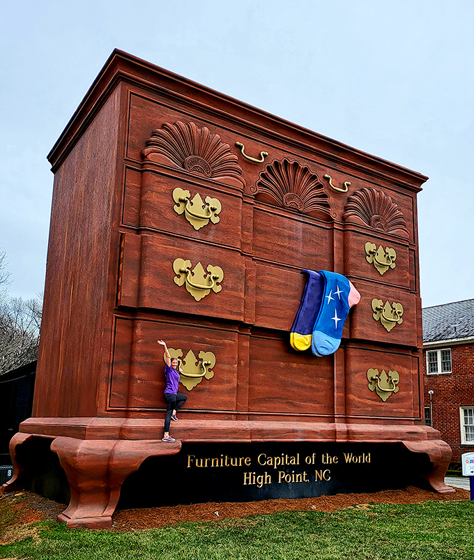 Who needs climbing walls when you have giant drawer pulls? This adventurous visitor turns furniture appreciation into an extreme sport.