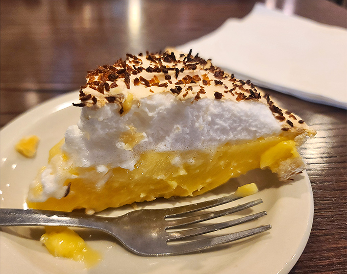 Coconut cream pie that would make your grandmother both proud and jealous. That meringue is practically floating above the plate!