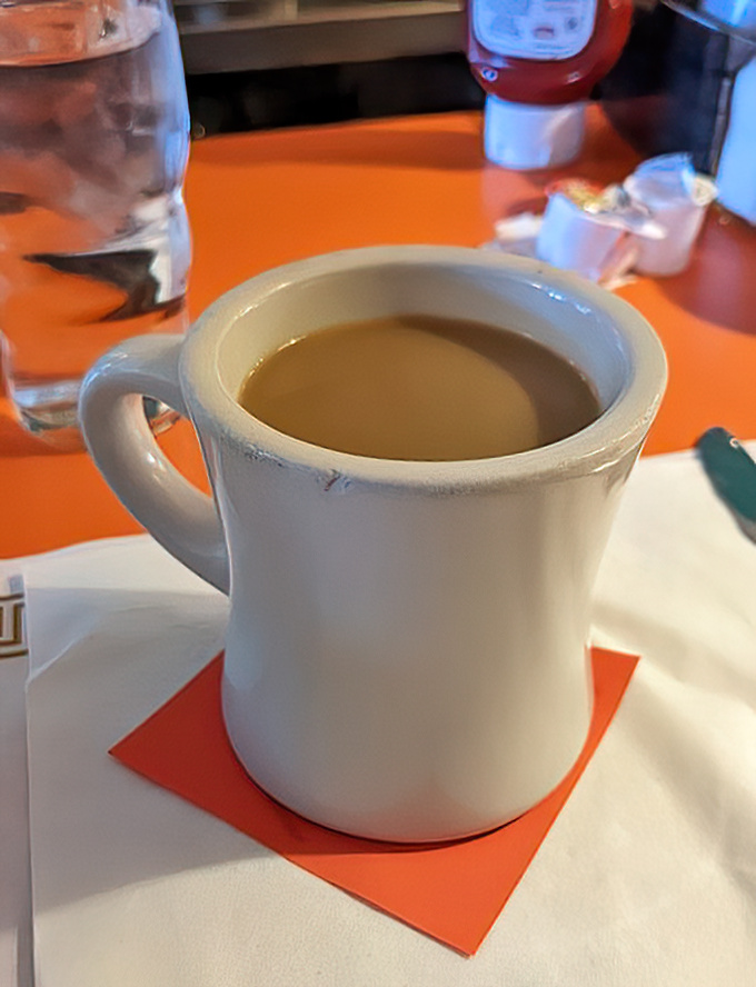 The humble diner coffee mug&mdash;sturdy, unpretentious, and filled with liquid motivation. No fancy latte art needed when the coffee speaks for itself.