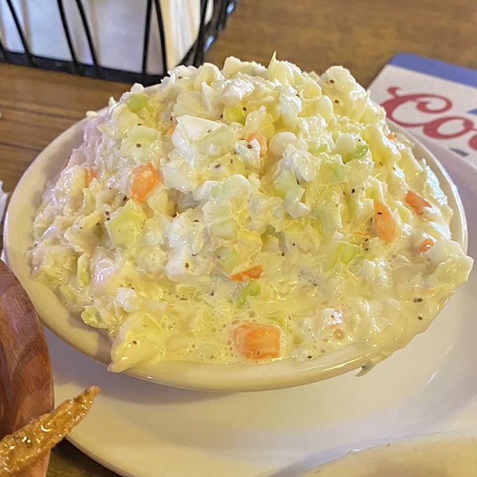 Coleslaw that actually deserves table space! Crisp, fresh, and thoughtfully seasoned—not just the obligatory vegetable afterthought most restaurants serve.
