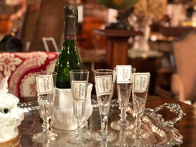 Village Antiques tags dangling like promises on crystal flutes. The perfect excuse to finally host that dinner party you've been talking about since 2019.