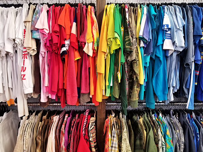 The clothing section organized by color &ndash; because even secondhand shopping deserves a moment of zen-like order.