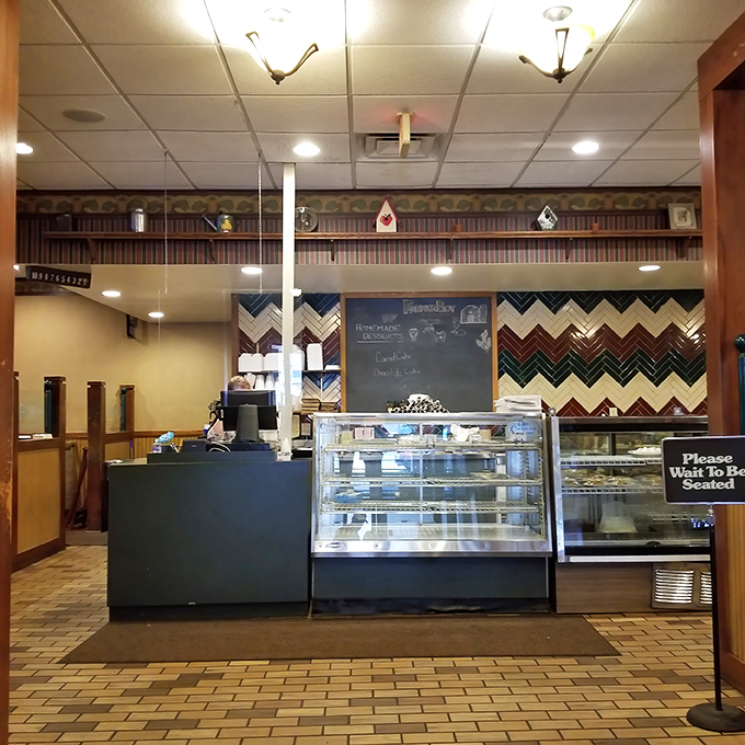 The dessert counter &ndash; where willpower goes to die. That chalkboard announces homemade desserts like a town crier of temptation.