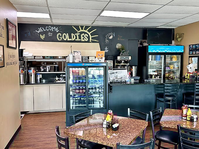 The counter welcomes you with a hand-drawn "WELCOME to GOLDIE'S" that feels like the breakfast equivalent of a warm hug.