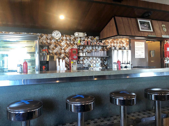 The counter view&mdash;where breakfast theater unfolds daily with short-order cooks as the unsung heroes of morning happiness.