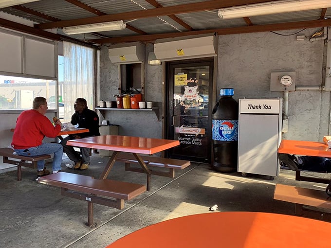 Simple picnic tables under cover offer shelter from the elements but not from the inevitable food coma that follows these epic sandwiches.