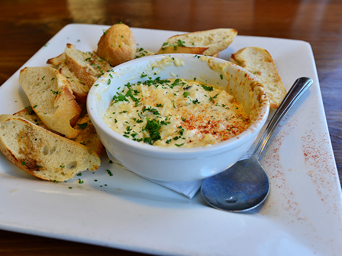 This bubbling crab dip isn't just appetizing&mdash;it's hypnotizing. Watching the cheese pull as you dip that garlic toast should be a spectator sport.