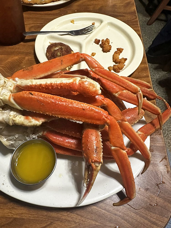 Snow crab legs so impressive they deserve their own zip code. That cup of melted butter is liquid gold waiting to happen.