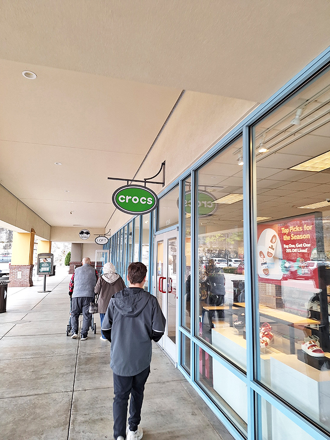 The distinctive Crocs sign guides comfort-seekers to their destination. For some shoppers, practical footwear trumps fashion&mdash;especially at outlet prices.
