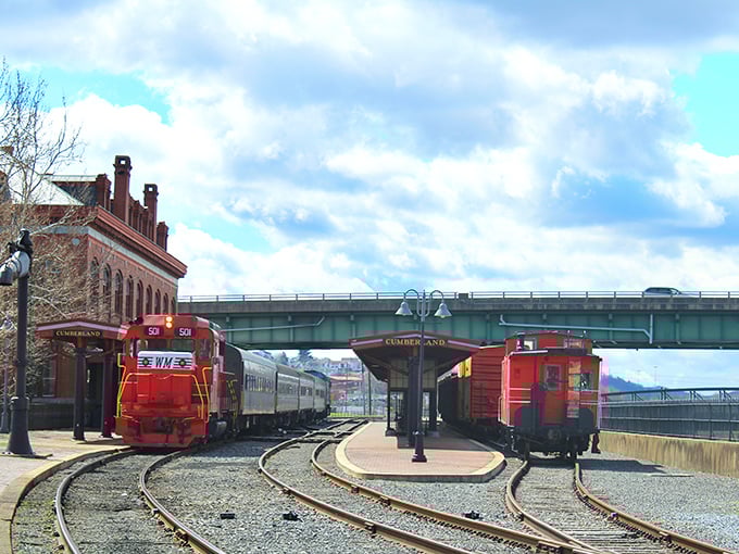 A railroad ballet unfolds at Cumberland Station as trains prepare for their journeys. The choreography of arrival and departure hasn't changed in a century.