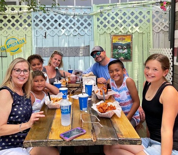 The true measure of a great restaurant: happy faces around the table and empty baskets that once held seafood treasures.
