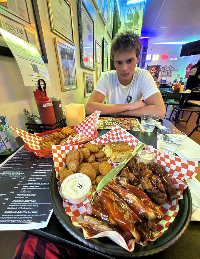 A feast fit for royalty served on humble red checkered paper. Notice nobody's talking? That's the sound of BBQ bliss.
