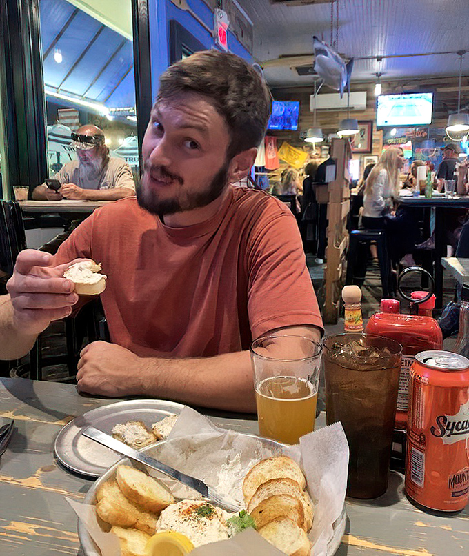 The face of someone who just discovered seafood nirvana. That expression is universal language for "you've got to try this."