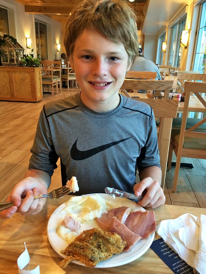 The joy on this young diner's face says it all&mdash;some food memories stick with you longer than any souvenir t-shirt ever could.