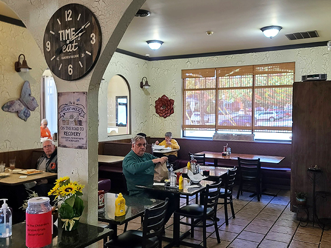 The "Time to eat" clock speaks the universal truth of diners. Under those charming arches, strangers become neighbors over coffee and conversation.