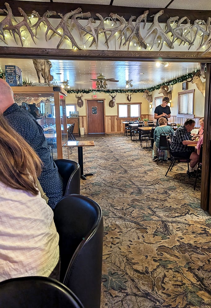Where deer mounts meet dining tables&mdash;the dining room balances hunting lodge aesthetics with the warm comfort of your favorite relative's home.