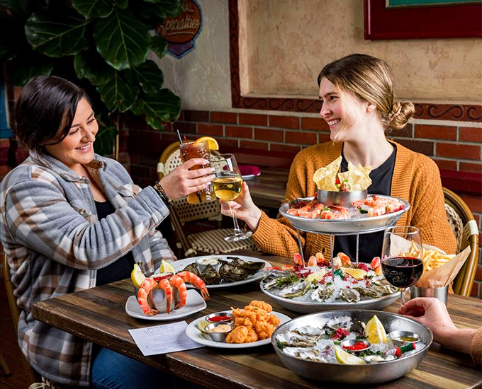 Seafood brings people together &ndash; a feast of oysters, shrimp, and shared plates that turns strangers into friends and meals into memories.
