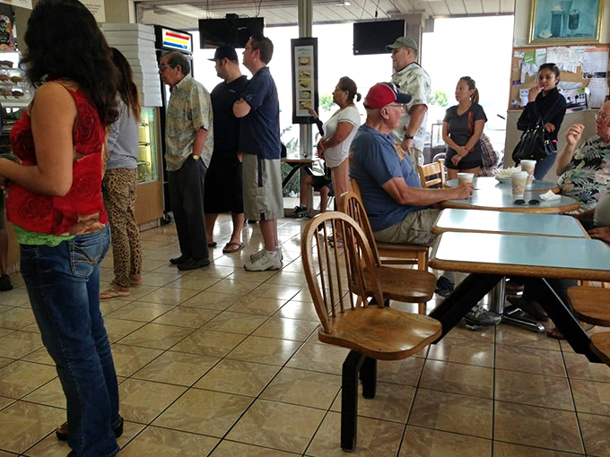 The line forms early at The Donuttery, where strangers become comrades united in the noble pursuit of fried dough excellence.