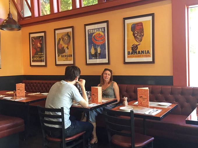 The intimate dining room where strangers become friends over shared recommendations and the mutual appreciation of good food.