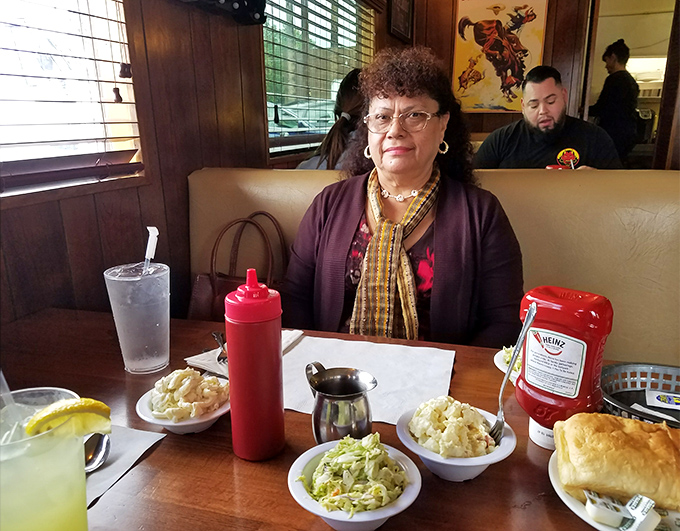 The sides at Hogly Wogly's aren't afterthoughts &ndash; they're supporting actors in a meaty blockbuster. That red sauce bottle holds liquid gold.