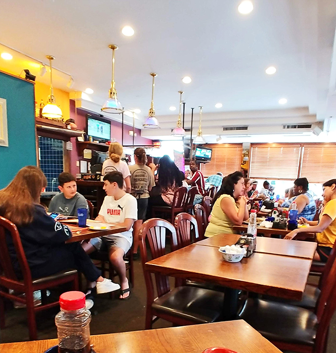 Where strangers become temporary breakfast companions. The buzz of conversation and clinking silverware creates the perfect morning soundtrack.