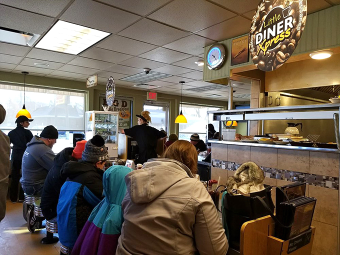The counter seats fill early with regulars who've earned their spot through years of faithful patronage and generous tipping.
