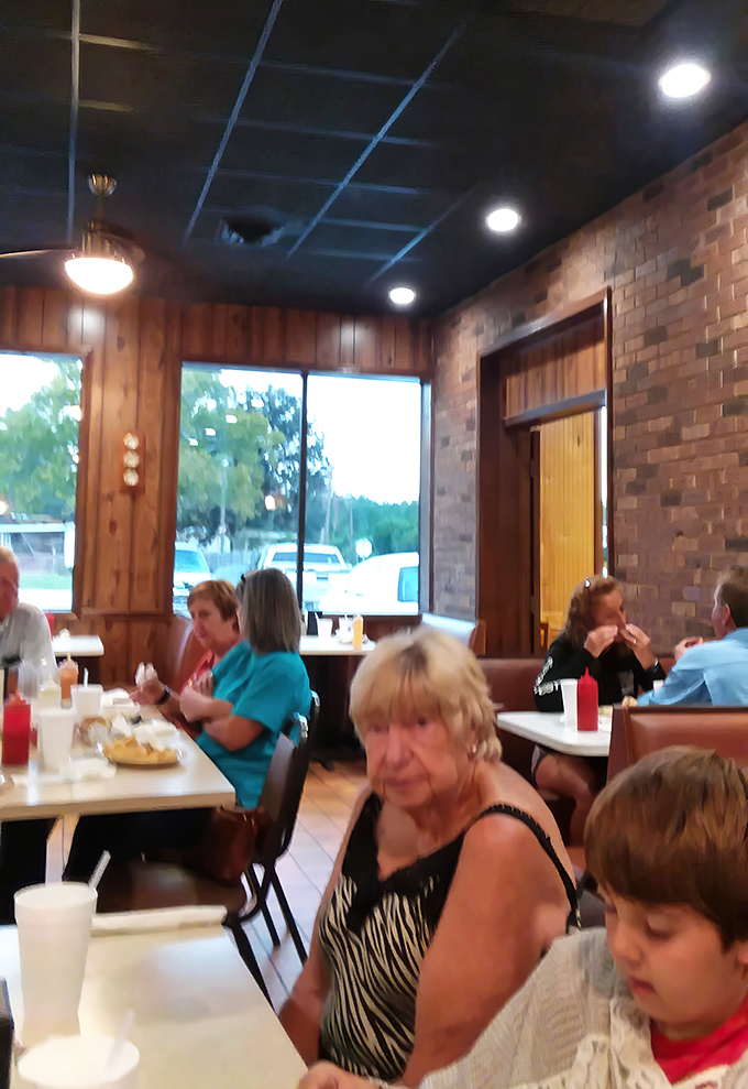 The dining room hums with the soundtrack of community&mdash;forks against plates, laughter, and conversations that matter more than whatever's happening on your phone.