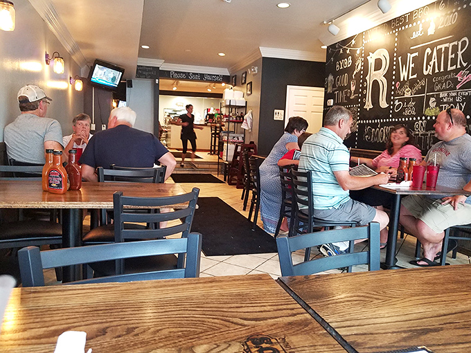 The dining room buzzes with the satisfied energy of people discovering their new favorite barbecue spot.
