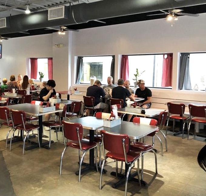 The dining room hums with the satisfied murmurs of patrons who've discovered that happiness is just a biscuit away in this temple of morning delights.