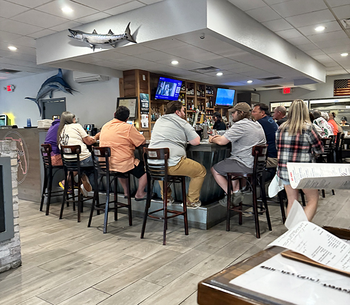 The bar area buzzes with locals who've discovered what you just did &ndash; this place knows its seafood.