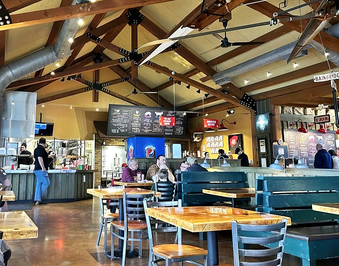 Exposed beams, natural light, and hungry patrons plotting their next move. The calm before the sauce-smeared storm.