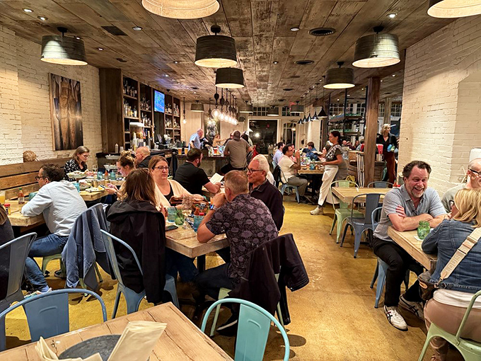 The dining room buzzes with the universal language of "mmm" as strangers become united in the brotherhood of great seafood.