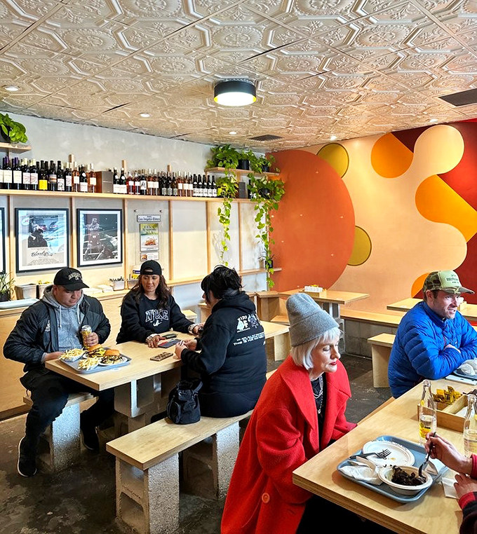 A cross-section of LA life sharing one common language: great food. From red coats to work boots, everyone speaks fluent burger here.