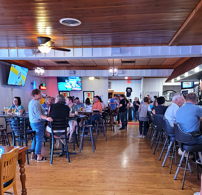 The bustling dining area proves that good food creates community&mdash;strangers becoming friends over shared appreciation of barbecue excellence.