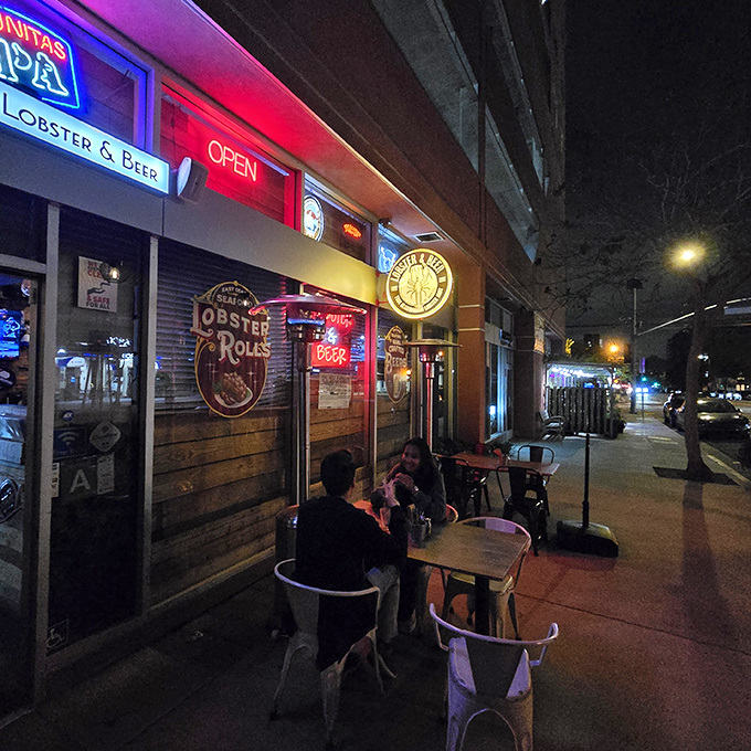 Night falls, neon glows, and outdoor tables become front-row seats to the delicious drama unfolding at Lobster & Beer.