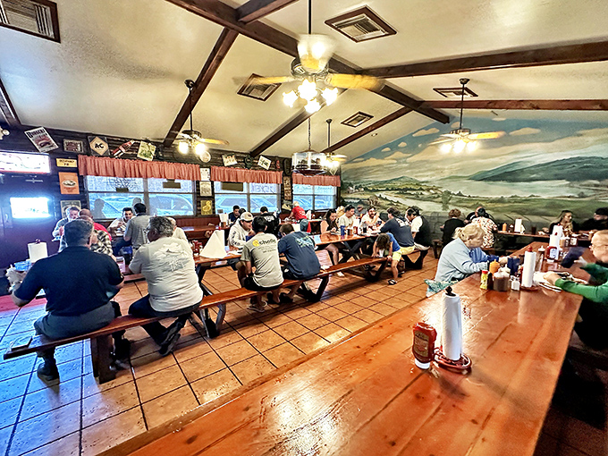 The communal dining experience at its finest&mdash;strangers united by wooden benches and the universal language of "pass the sauce, please."