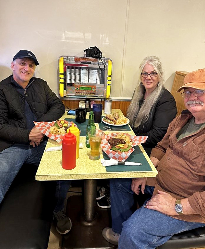 The universal language of good food bringing folks together around a table that's seen decades of stories, laughter, and clean plates.