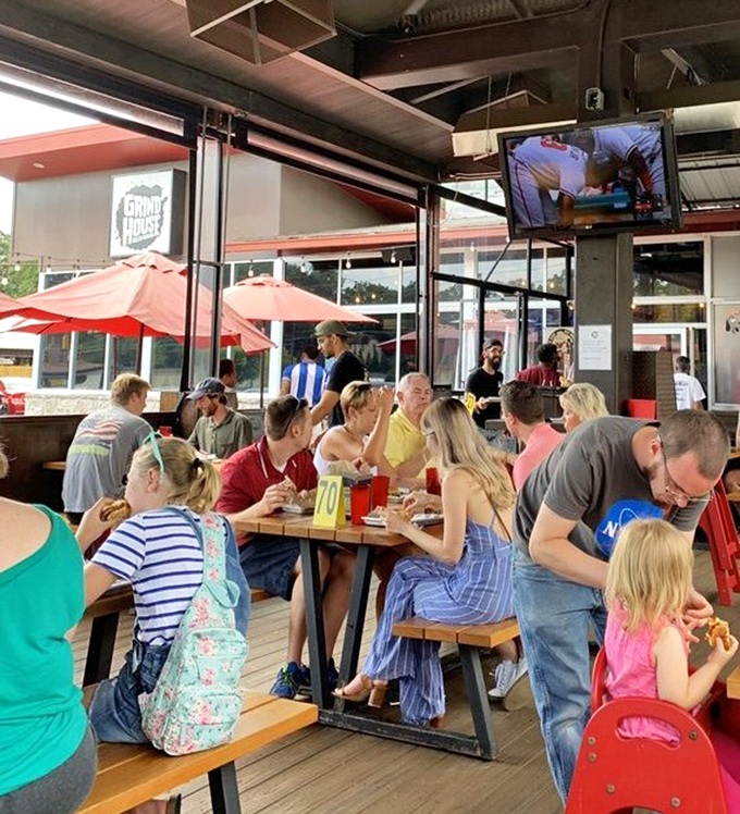 The patio buzzes with the universal language of burger appreciation – a democratic gathering where everyone from toddlers to grandparents speaks "yum."