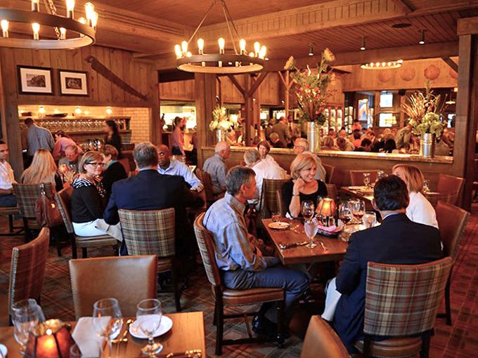 The dining room buzzes with the unmistakable energy of people having the kind of meal they'll be talking about tomorrow at work.