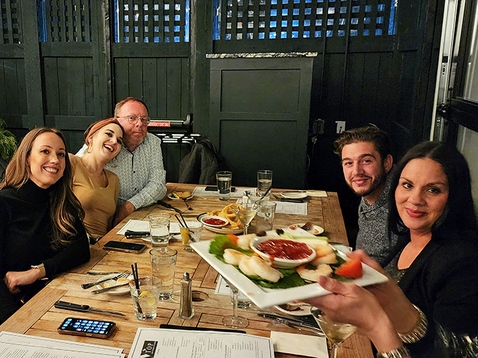 The true measure of a great restaurant: happy faces around the table, sharing seafood and stories. Memory-making in progress.