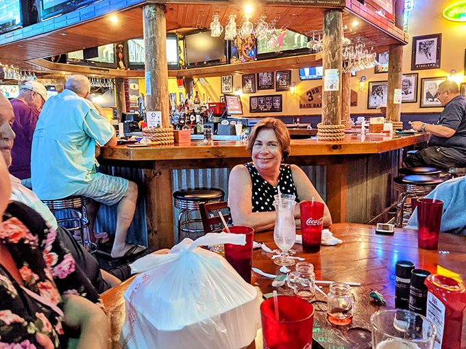 The circular bar where strangers become friends and fish tales grow taller. A hub of laughter, cold drinks, and that "everyone knows your name" feeling.