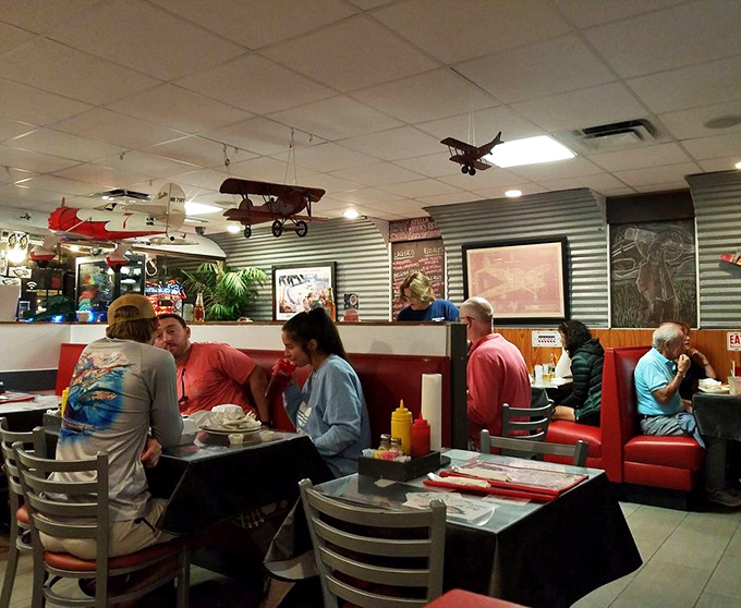 The dining room buzzes with the universal language of satisfied customers—the sound of people too busy eating to talk.