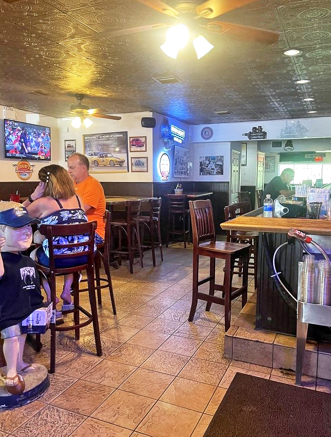 The casual dining room buzzes with that perfect mix of locals and tourists, all united by the universal language of "pass the tartar sauce."