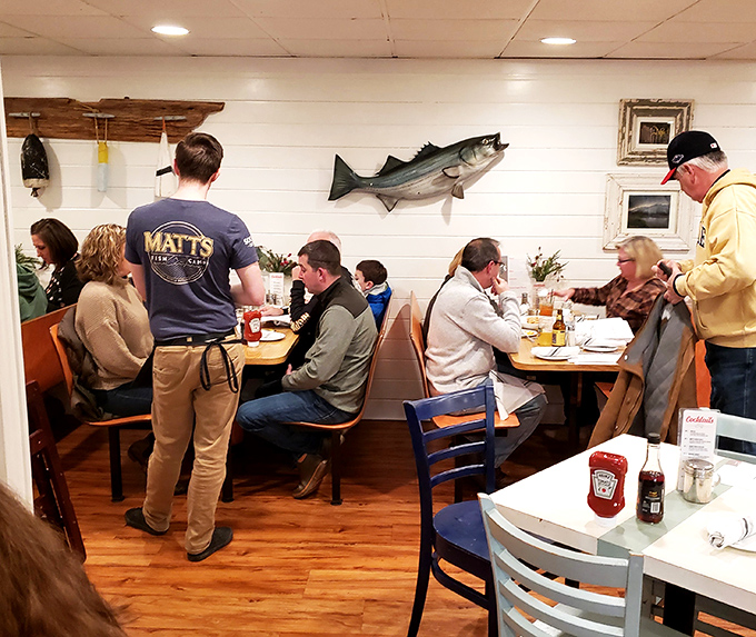 The dining room hums with the universal language of good eating&mdash;where strangers become friends over the shared religion of fresh seafood.
