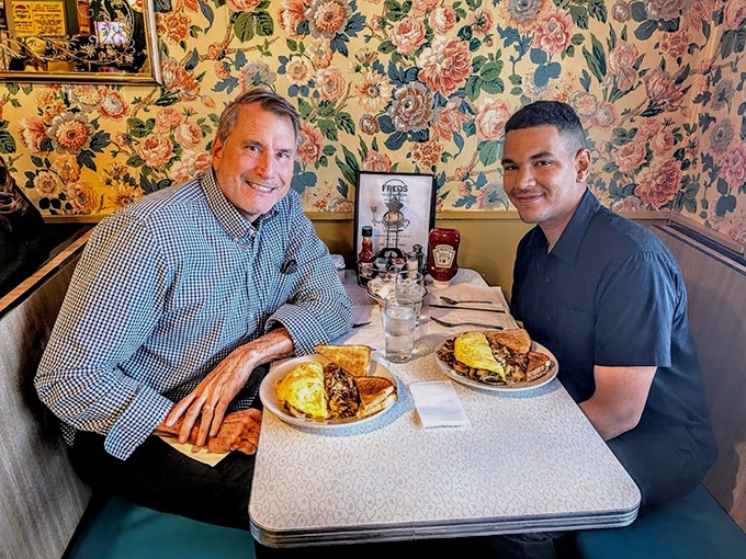 Every booth tells a story at Fred's, where strangers become friends over plates of food that make conversation momentarily unnecessary.