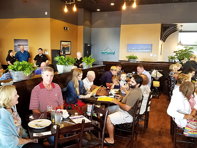 A dining room buzzing with the energy of people who've made the wise decision to let someone else cook their breakfast.