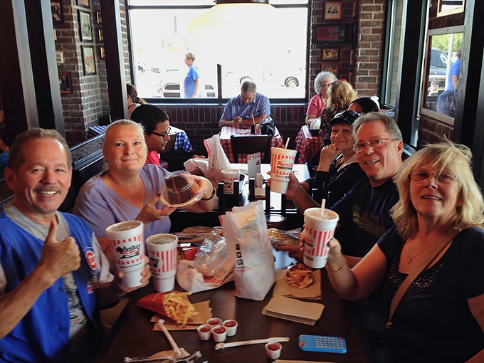 Happy faces around the table tell the real story of what great food can accomplish.