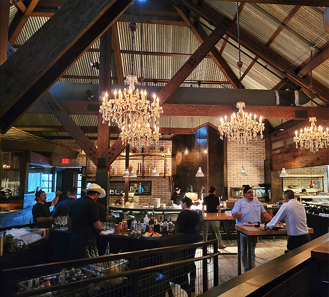 Crystal chandeliers hanging from corrugated metal ceilings? It's the perfect metaphor for this place: country roots with metropolitan ambitions.